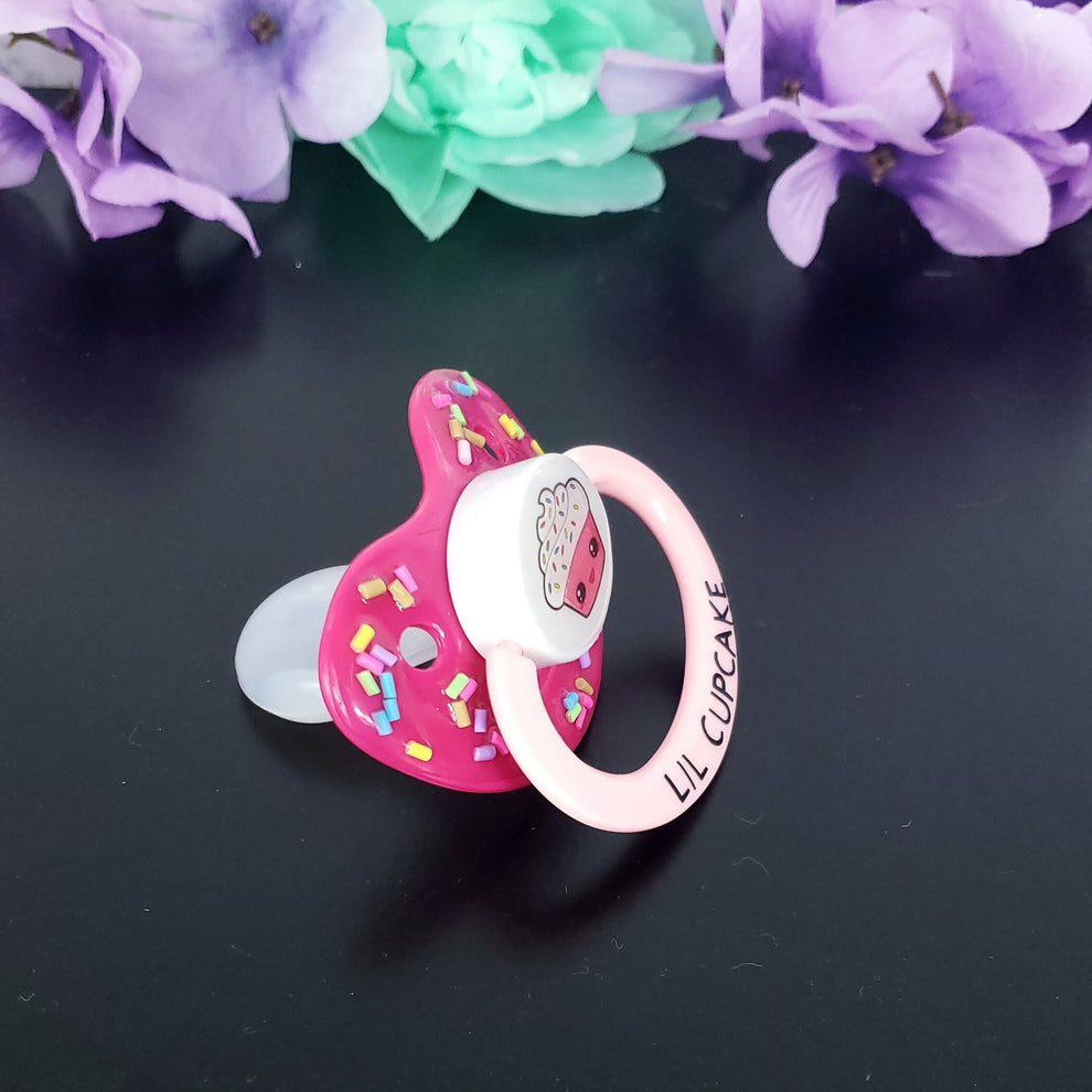 Indulge in Sweet Comfort with our Cupcake Themed Adult Pacifier