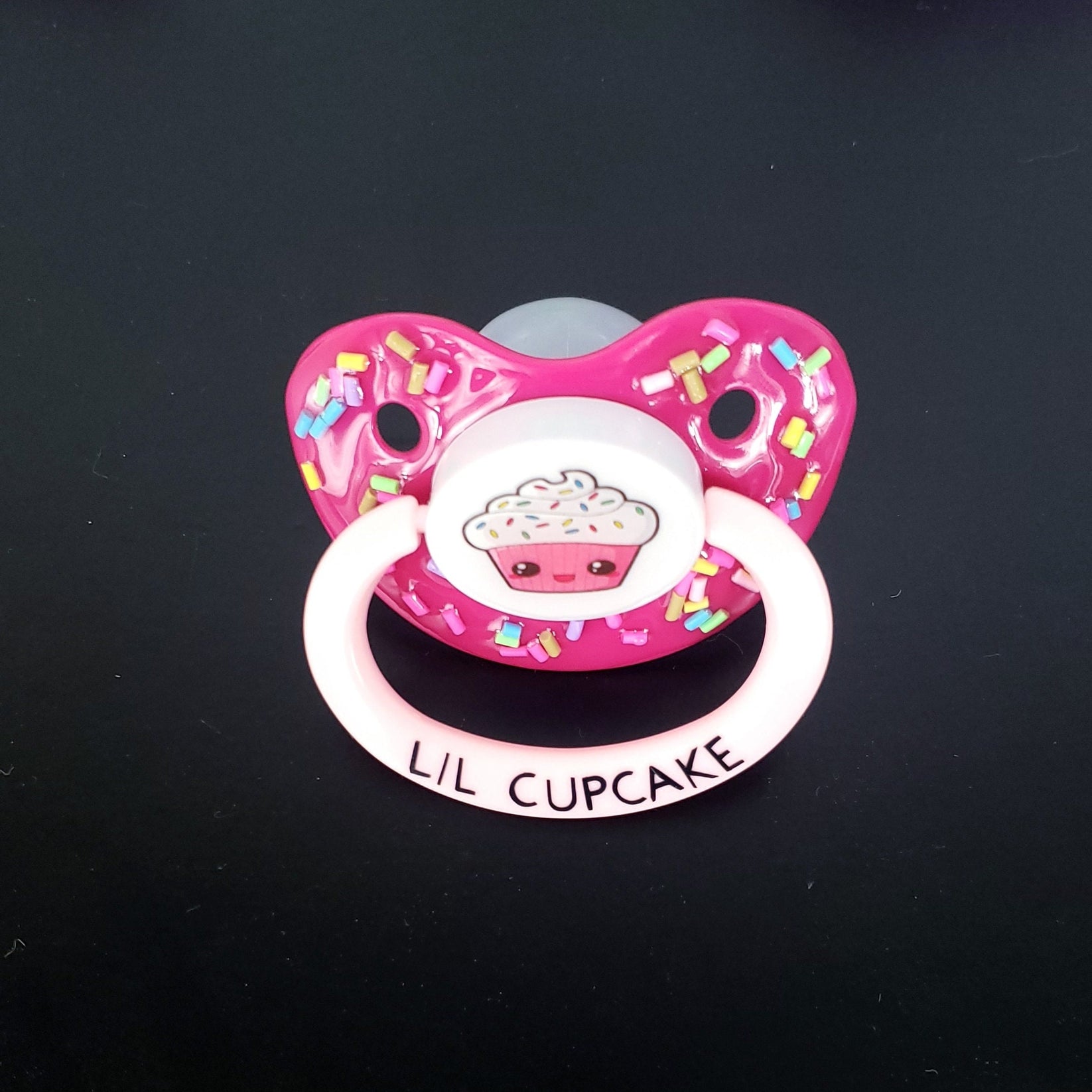 Indulge in Sweet Comfort with our Cupcake Themed Adult Pacifier